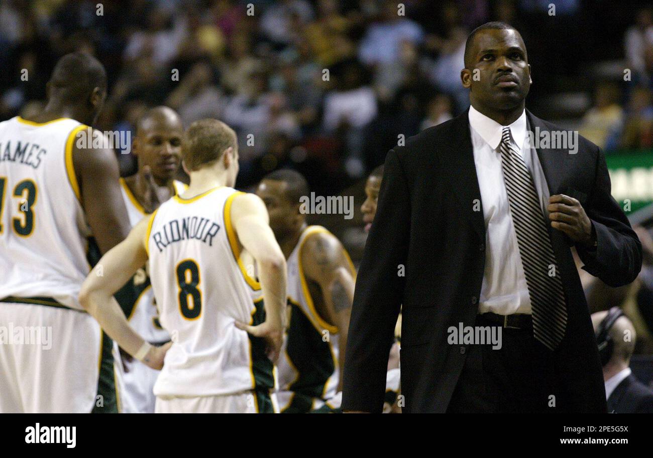 ** FILE ** Seattle SuperSonics Coach Nate McMillan, right, walks away ...