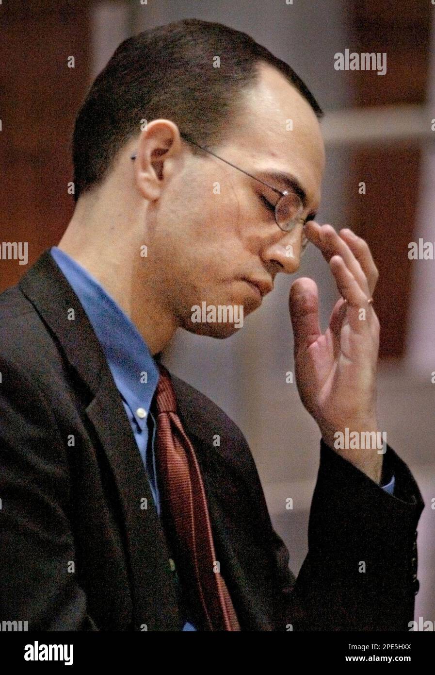Steve Rios adjusts his glasses as testimony continues in his trial ...