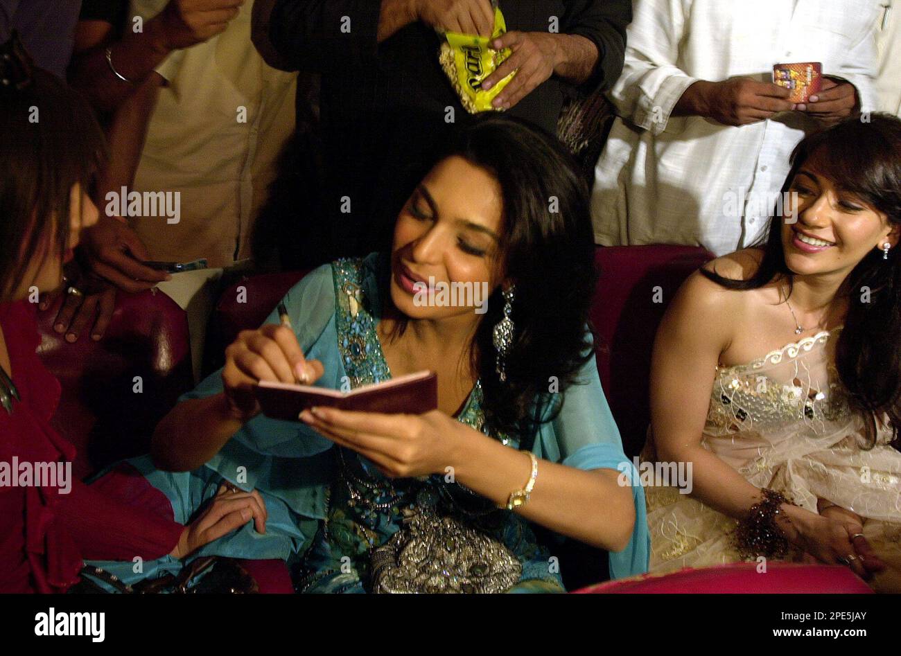 Pakistani actress Meera signs autographs during the premiere of her ...