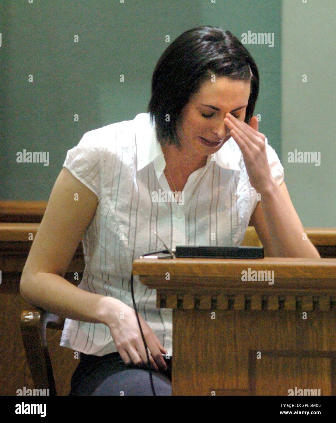 Joan Sheridan begins to weep on the witness stand Wednesday, May 18 ...