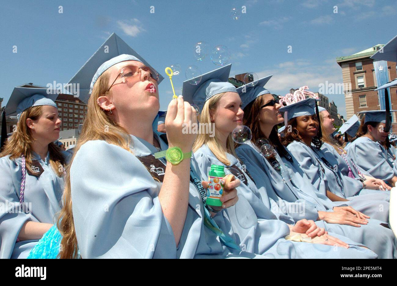 Ann Dumphy, a nursing student at Columbia University, blows bubbles ...
