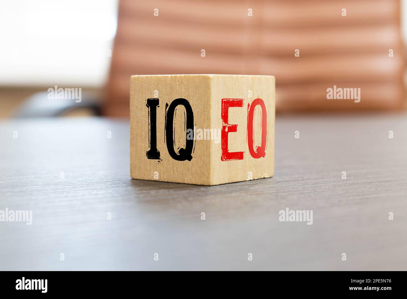 Wooden cubes with the expression 'IQ' 'Intelligence Quotient' to 'EQ' 'Emotional Quotient ...