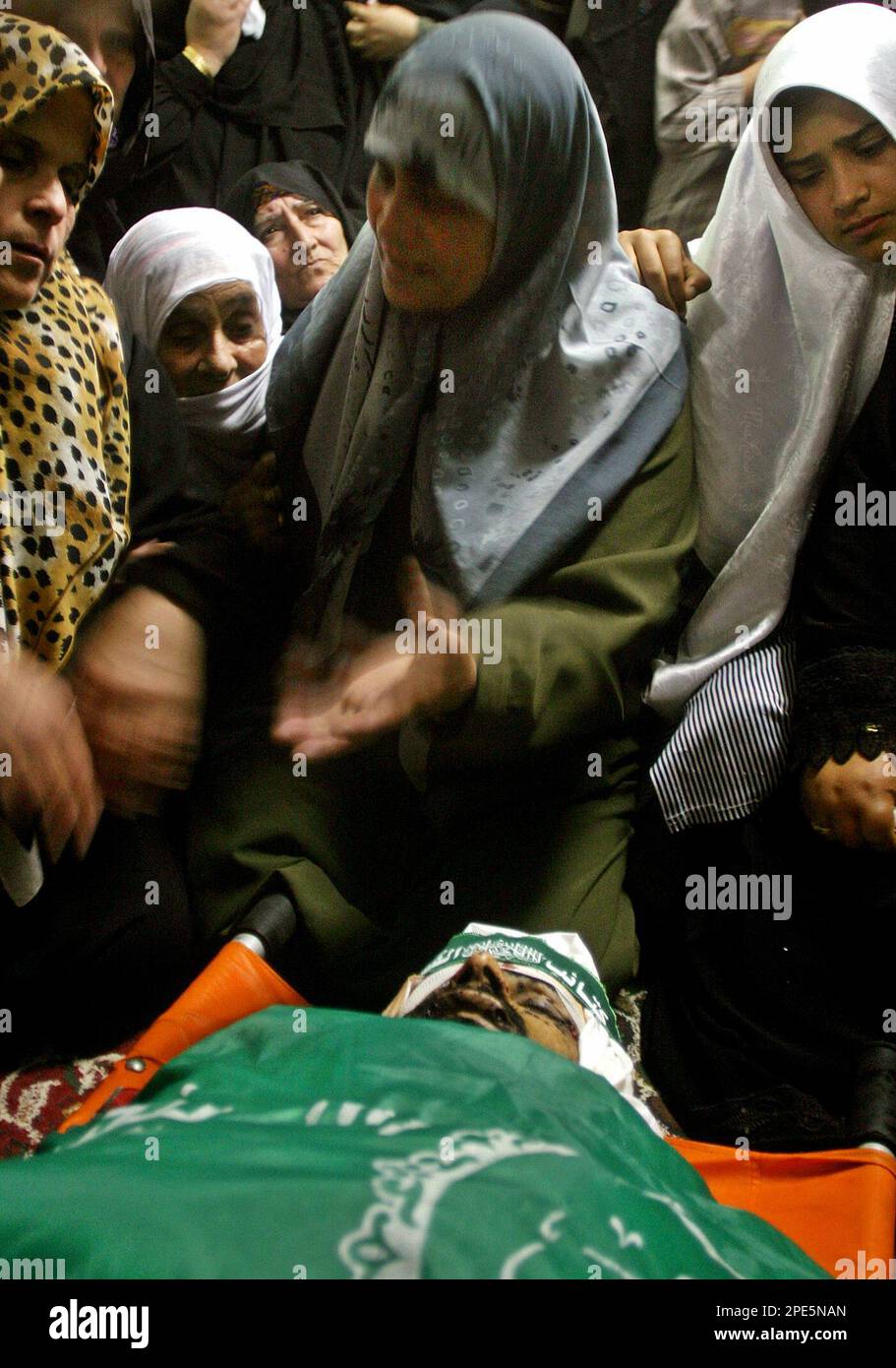 Relatives of Ahmed Barhoum, 22, a Hamas activist who was killed early ...