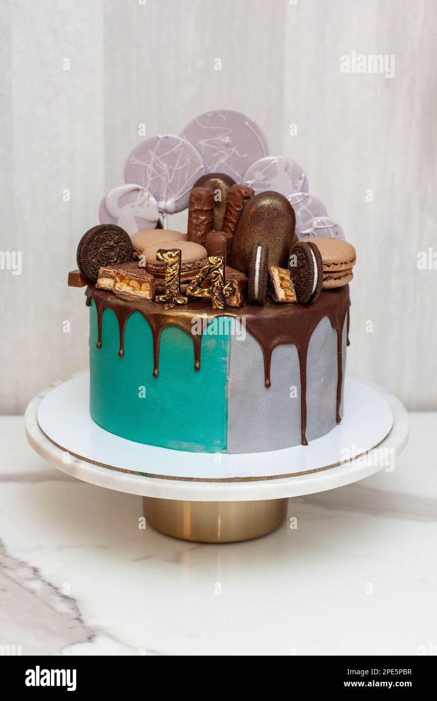 Delicious two-sided homemade birthday cake made in green and grey ...