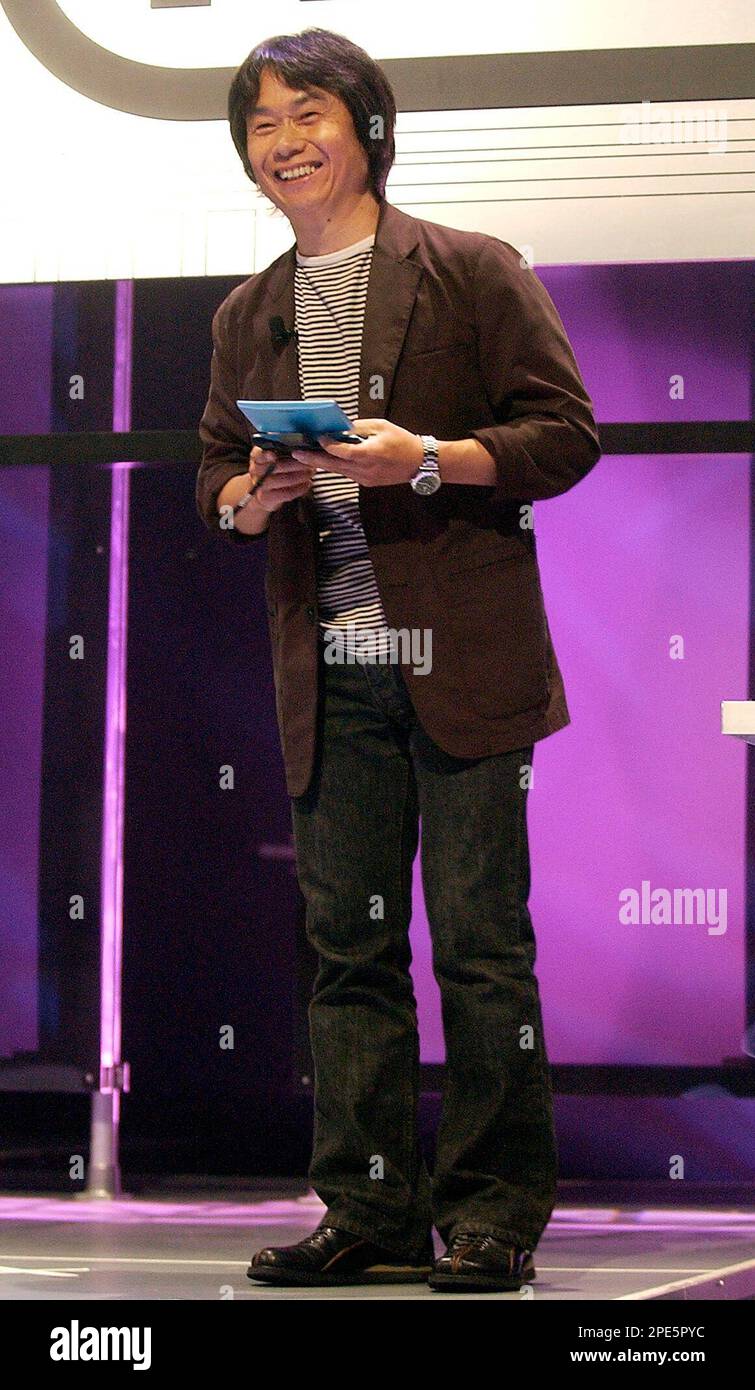 Nintendo game designer Shigeru Miyamoto comes on stage to introduce his ...