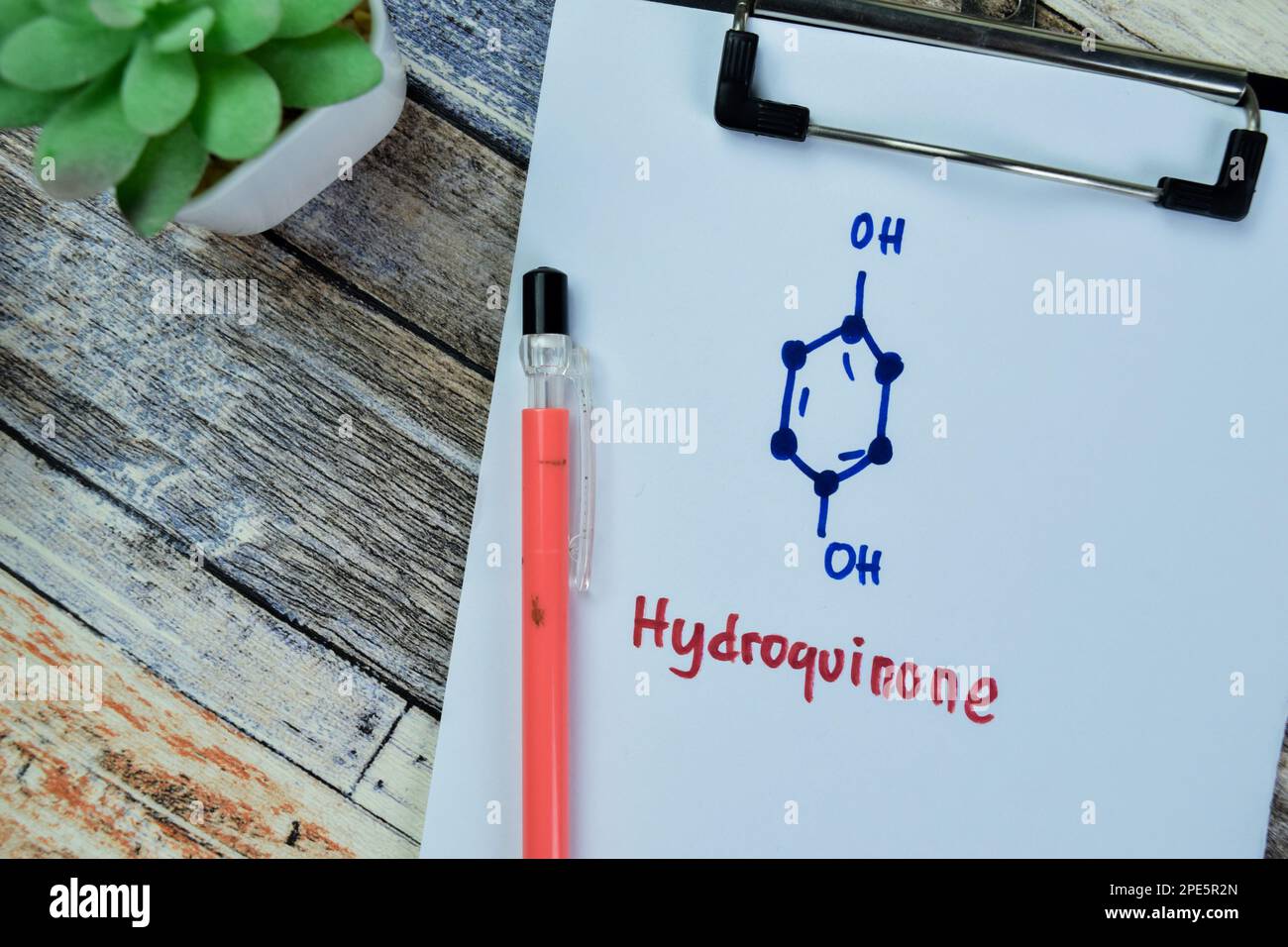 Concept of Hydroquinone write on paperwork, structural chemical formula ...