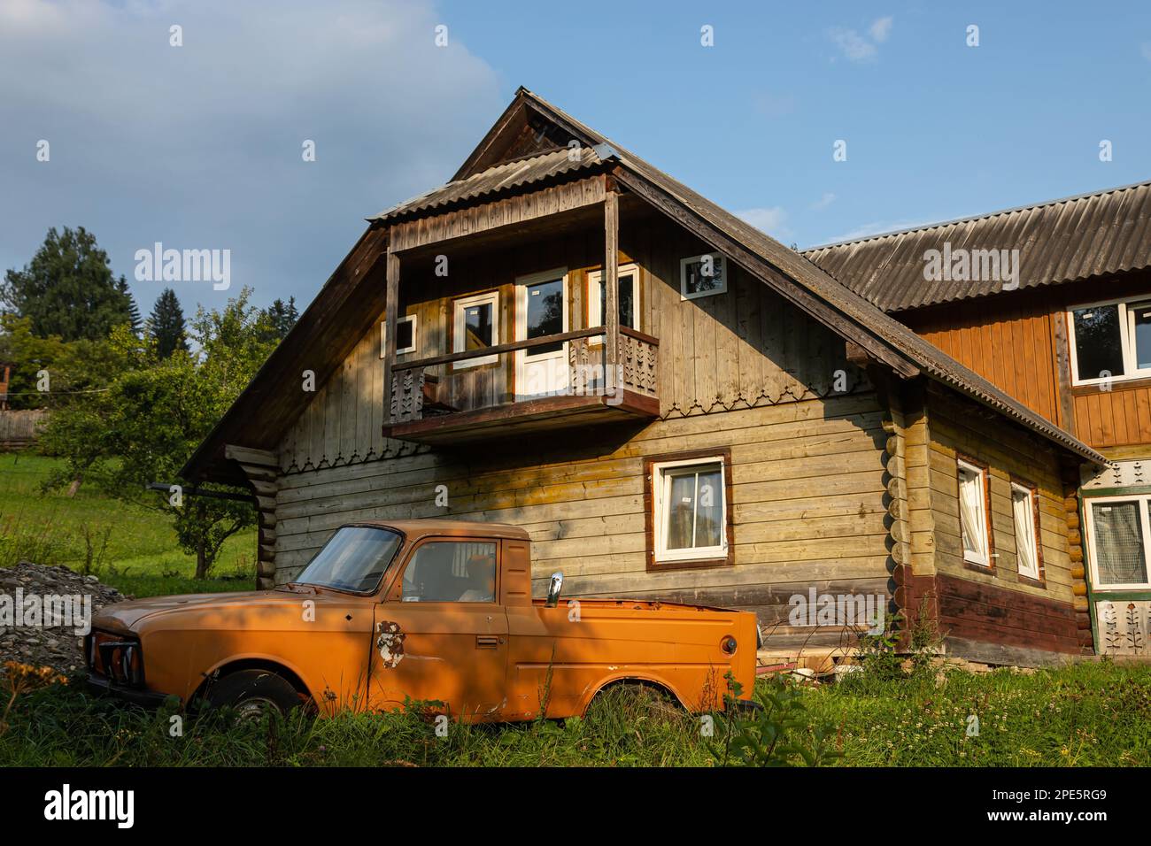 old vehicle abandoned car and wreck mess on the garden old house Stock ...