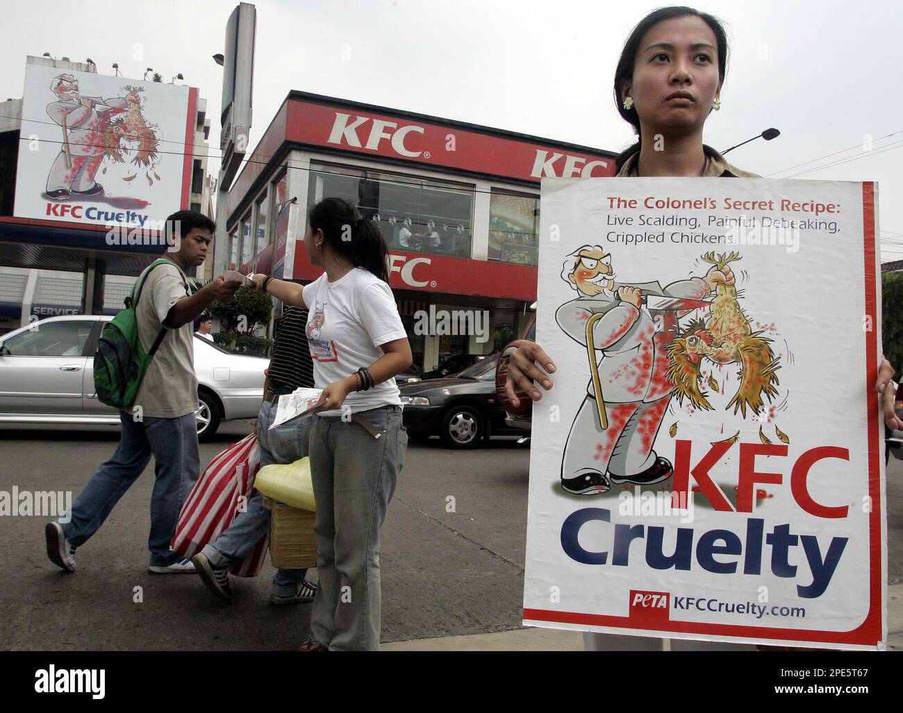 Members of the People for the Ethical Treatment of Animals distribute ...