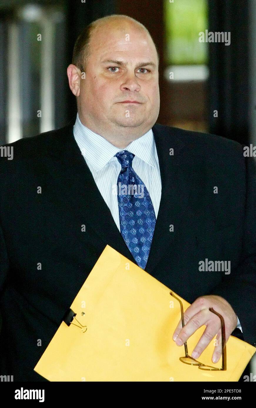 Contractor James Duff leaves federal court in Chicago, Monday, May 16 ...