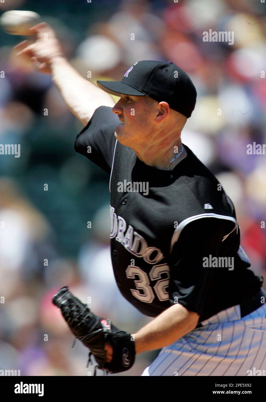 Colorado Rockies starting pitcher Jason Jennings delivers a pitch to ...
