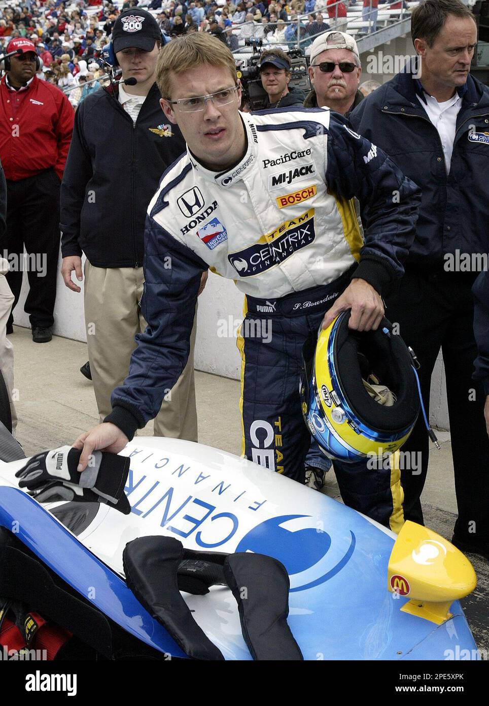 Indy Racing League driver Sebastien Bourdais of France gfrabs his ...