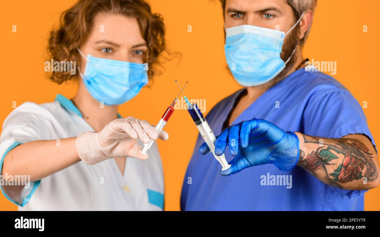 Vaccination syringe needle. Hospital staff. Medicines. Intravenous ...