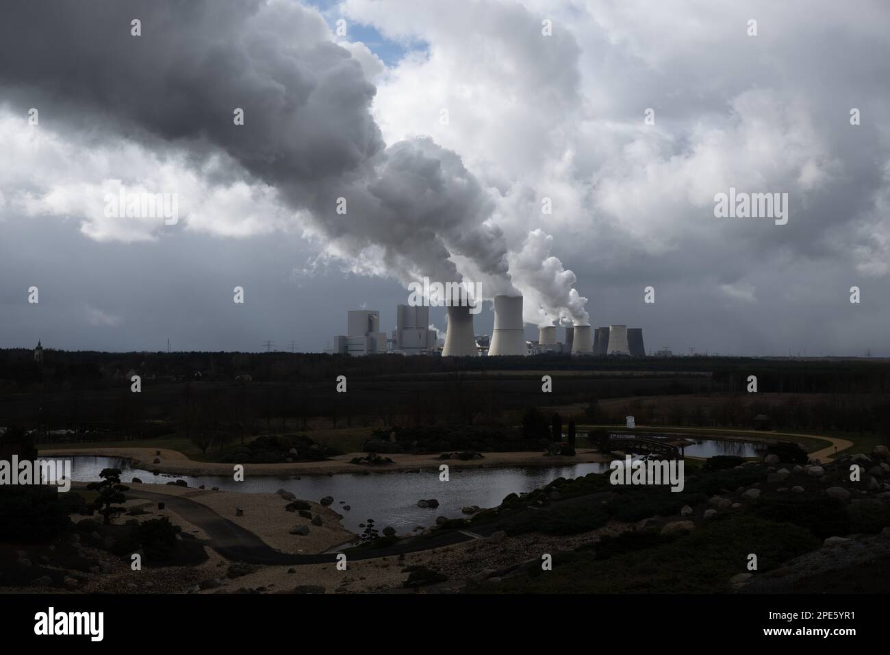 Boxberg, Germany. 15th Mar, 2023. Steam rises from the cooling towers ...
