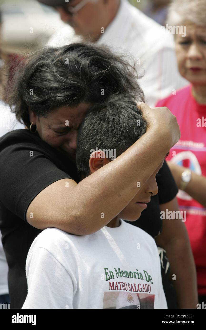 Emilia Salgado is overcome with emotion Saturday, May 14, 2005, as she ...