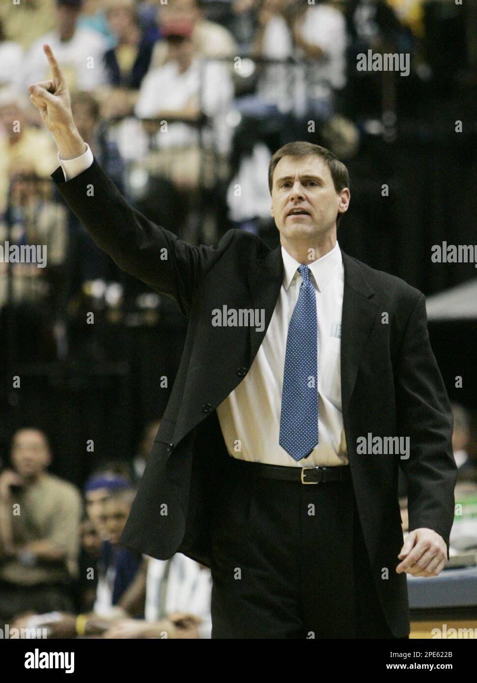 Indiana Pacers coach Rick Carlisle gives instructions to his team ...