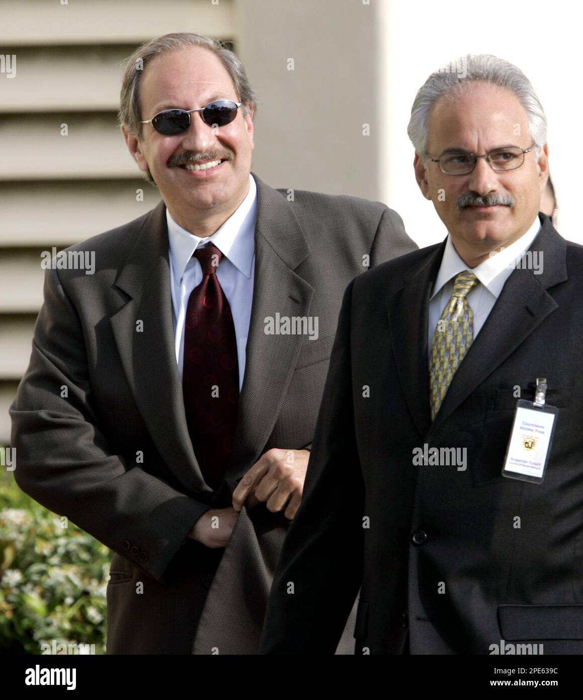 Former Michael Jackson attorney Mark Geragos, left, smiles as he ...