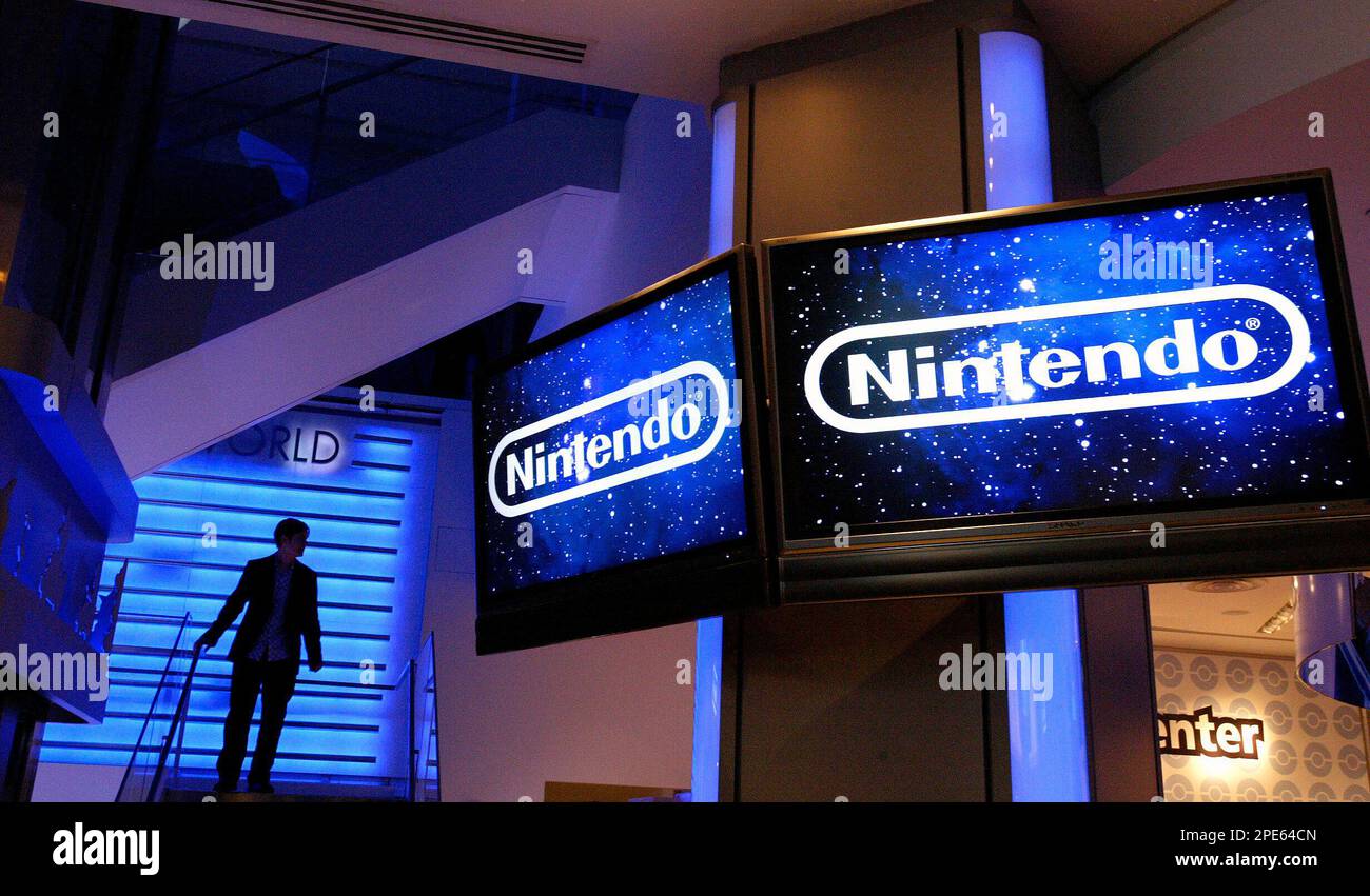 A man walks down stairs in the new store Nintendo World, in Rockefeller ...