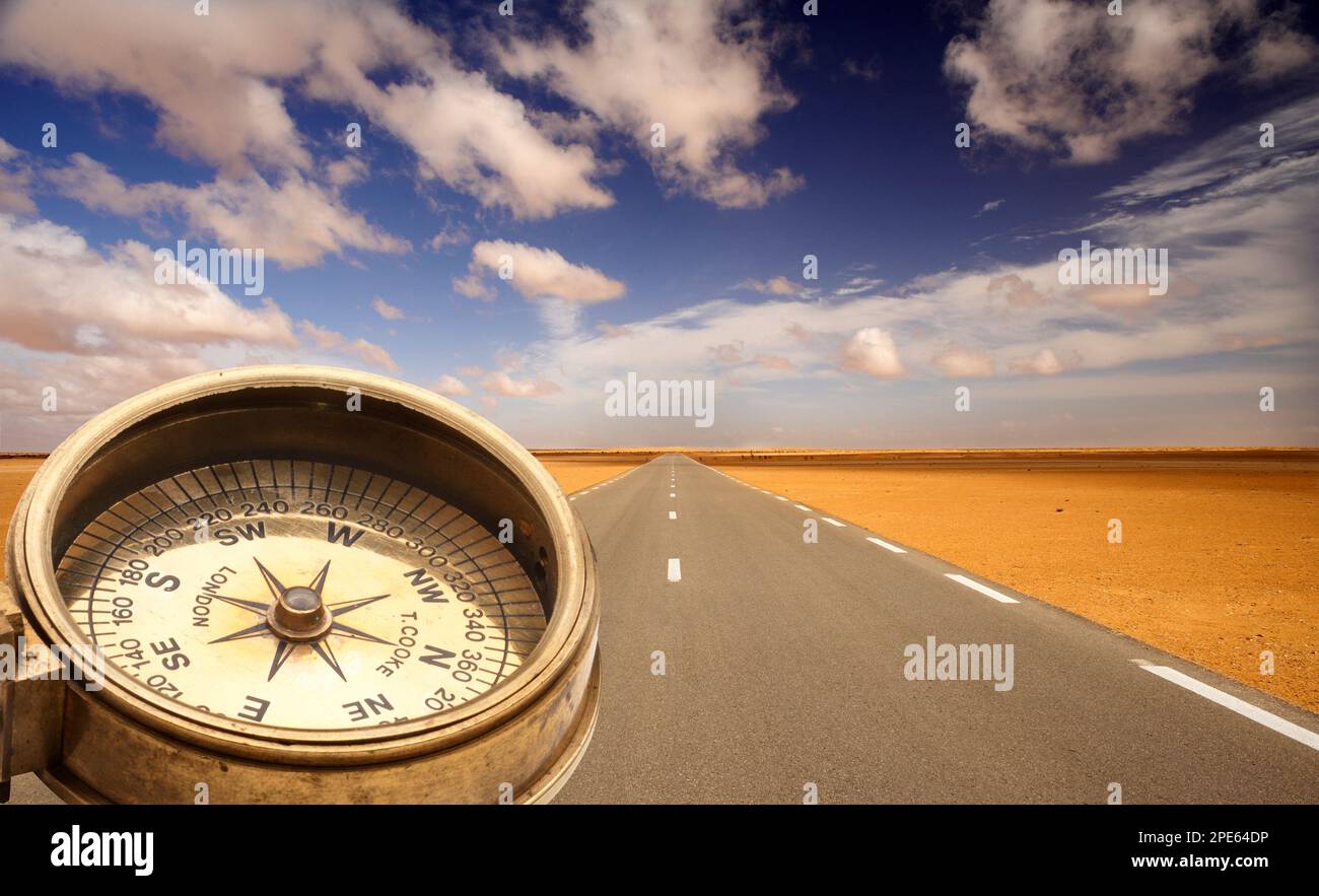 compass with road in the desert Stock Photo - Alamy