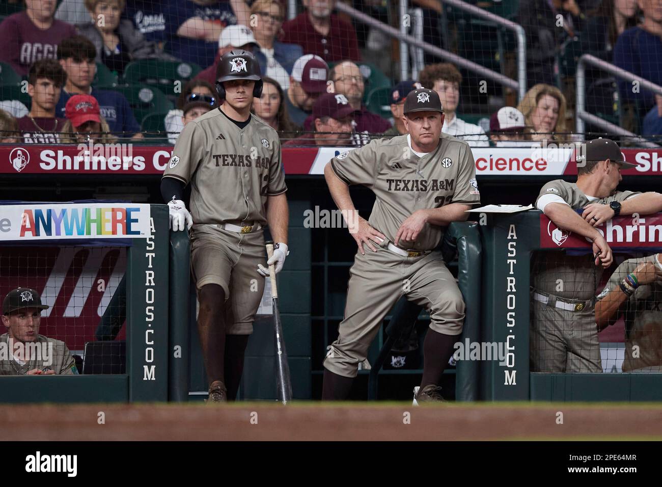 Texas A&M Aggies head coach Jim Schlossnagle (right) and Austin Bost ...