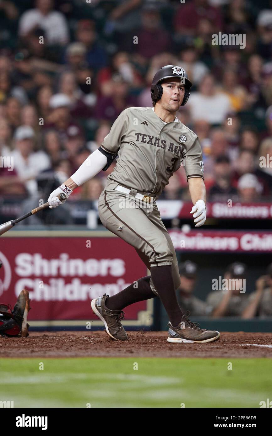 Kaeden Kent (3) of the Texas A&M Aggies follows through on his swing ...