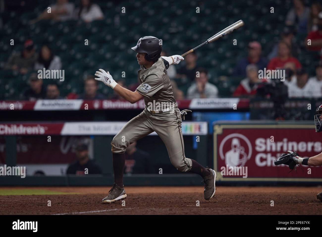 Kaeden Kent (3) of the Texas A&M Aggies follows through on his swing ...