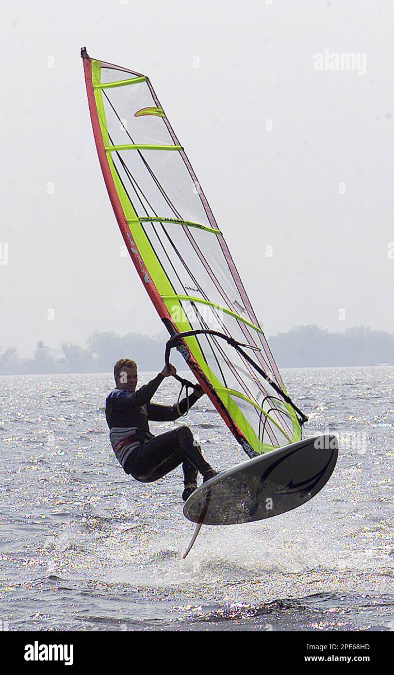 Mark Greinert of Beaver Dam, Wis., takes advantage of windy conditions ...