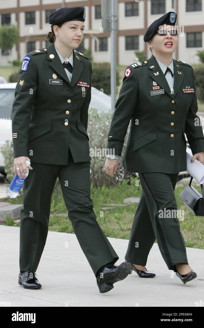 Spc. Sabrina D. Harman, left, and her attorney Capt. Patsy Takemura ...