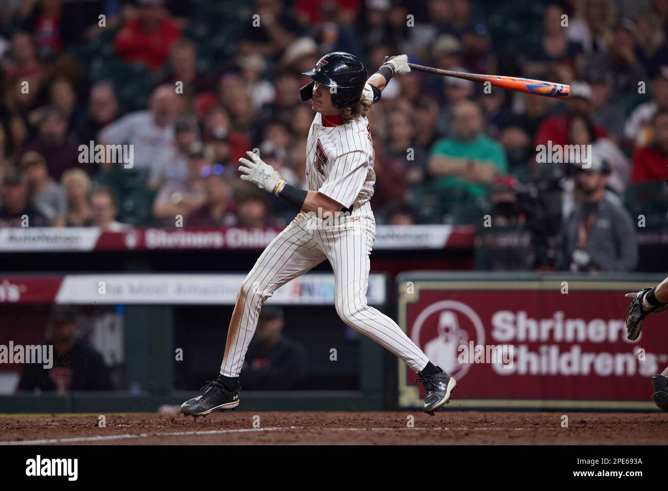 Gage Harrelson (2) of the Texas Tech Red Raiders follows through on his ...