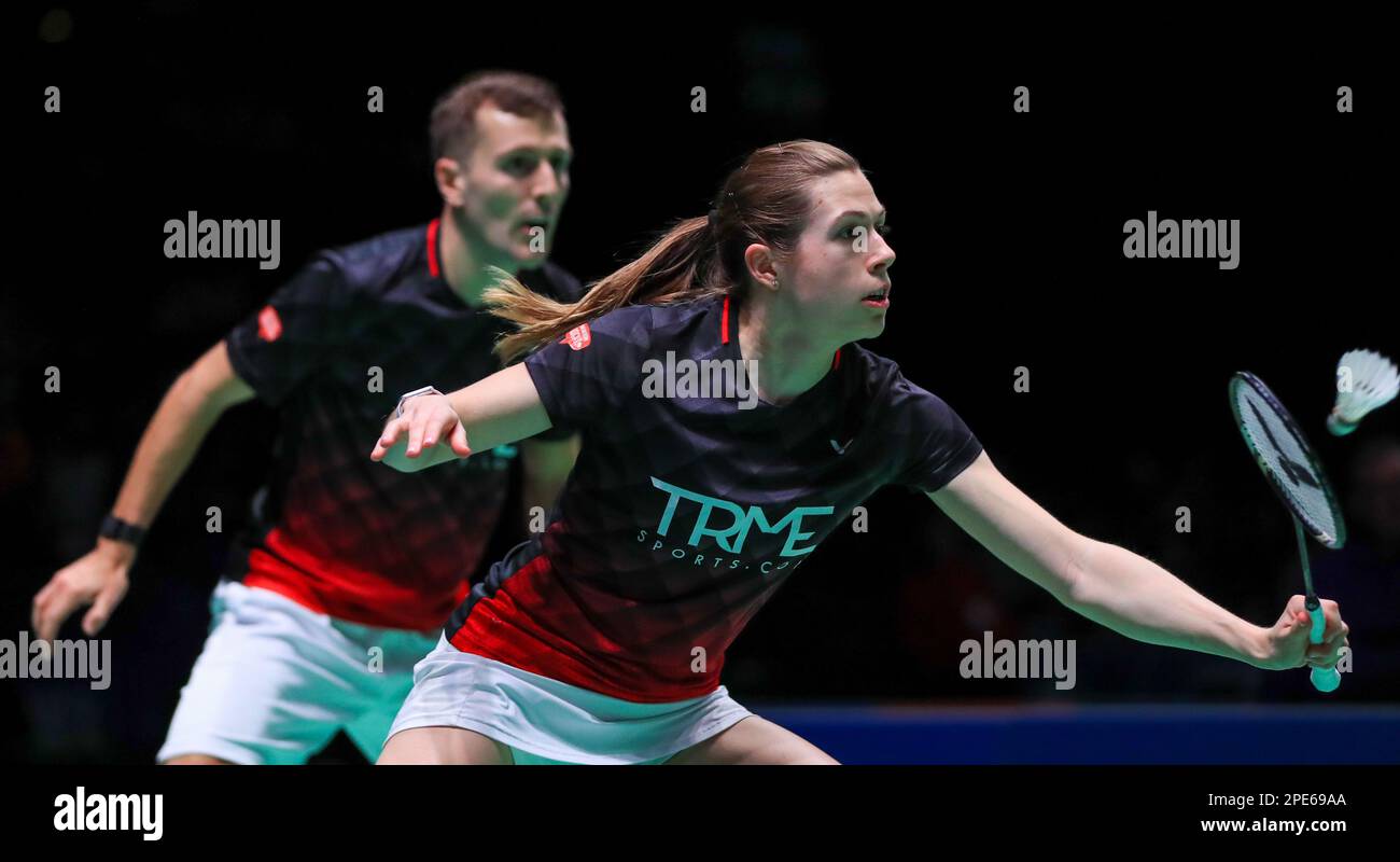 England's Jenny Moore (right) and team mate Gregory Mairs in action ...