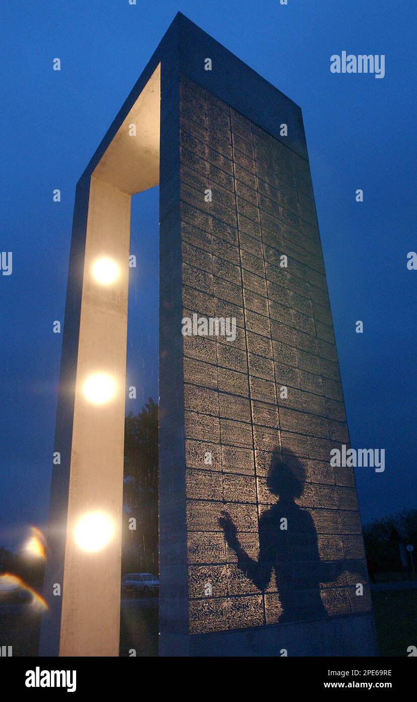 A figure is seen in a lightened, transparent wall, the so called Gate ...