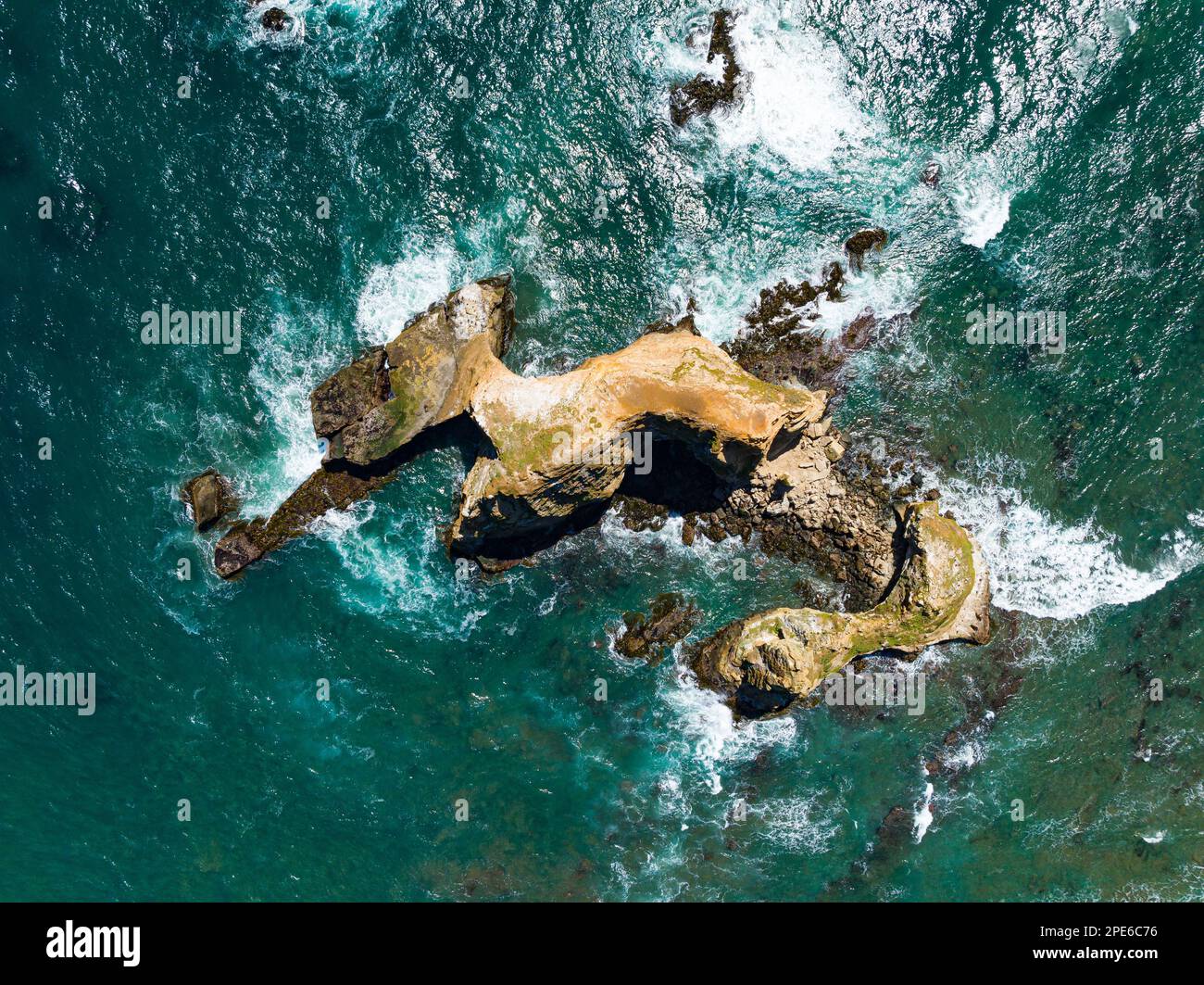 An aerial view of rocky cliffs in the Pacific Ocean in Chile Stock ...