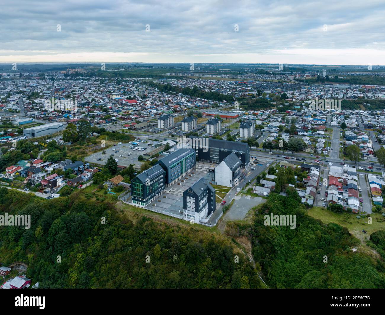An aerial view of a cityscape with many buildings, Puerto Montt, Chile ...