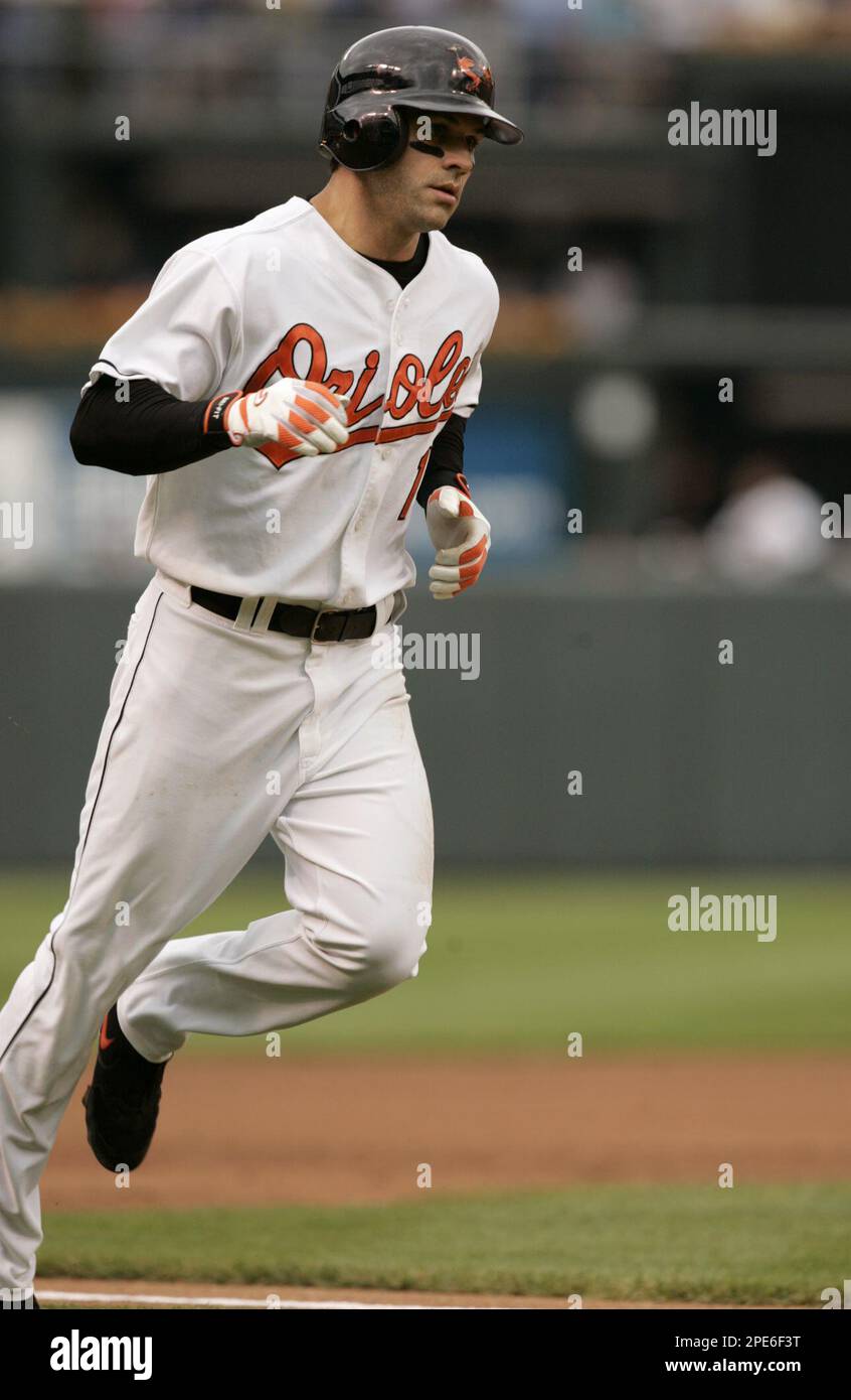 Baltimore Orioles' Brian Roberts heads for home after hitting a first ...