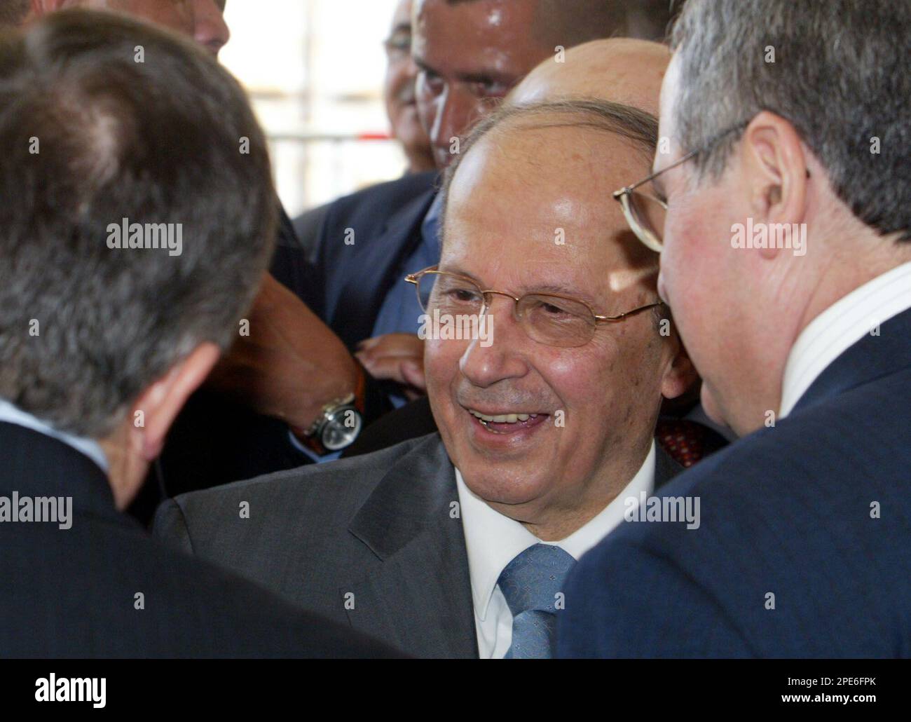 Anti-Syrian leader Michel Aoun, center, talks to Lebanese officials ...