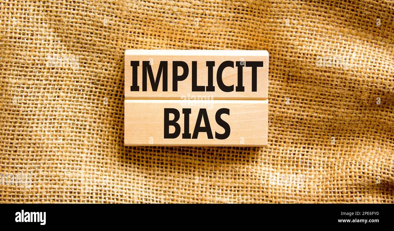 Implicit bias symbol. Concept words Implicit bias on wooden block ...