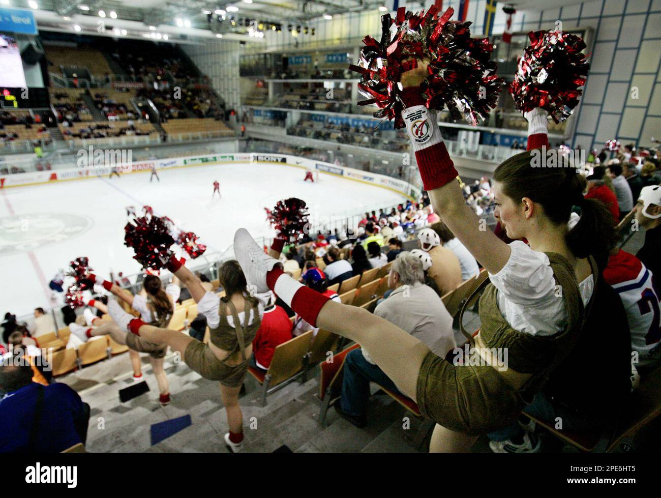 Austrian cheerleaders perform during a break in the play between ...