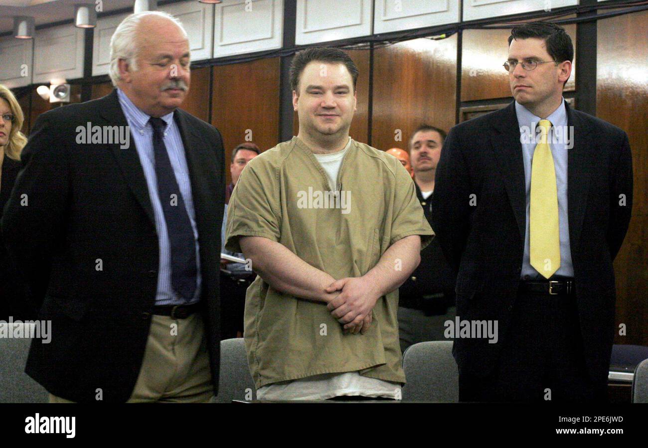 Charles McCoy Jr. stands with his defense attorneys S. Michael Miller ...