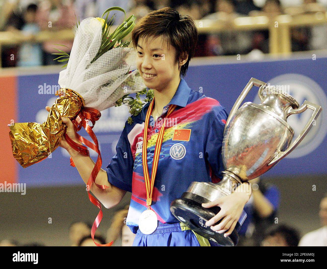 China's Zhang Yining poses during a prize ceremony for women's singles ...