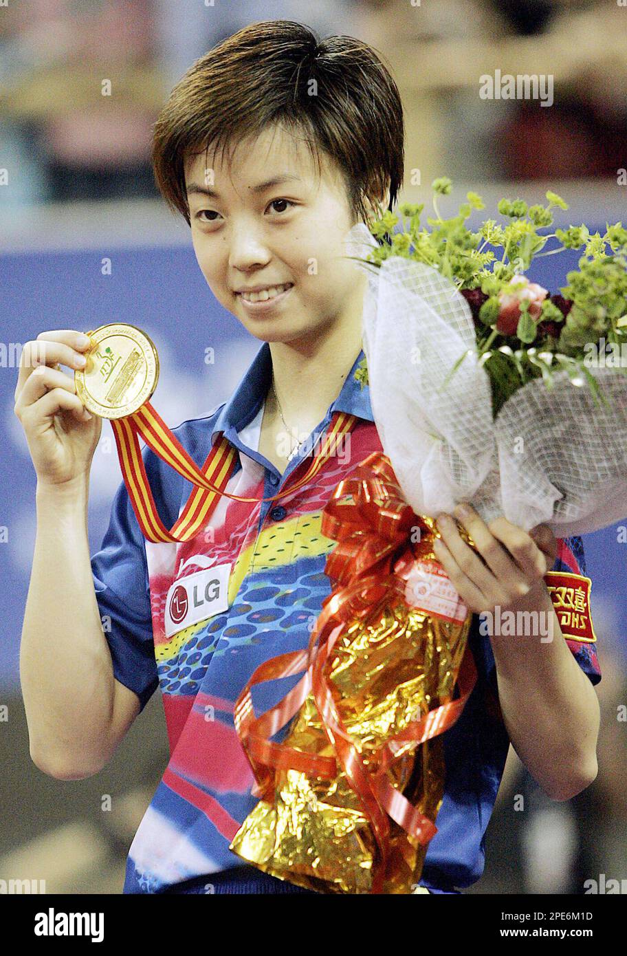 China's Zhang Yining poses during a prize ceremony for women's singles ...