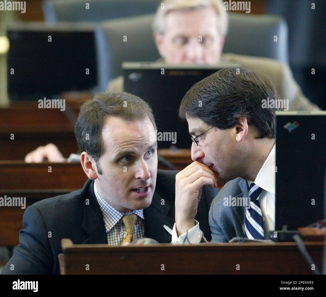 Rep. Bryan Hughes, R-Marshall, left, talks with Sen. Kevin Eltife, R ...