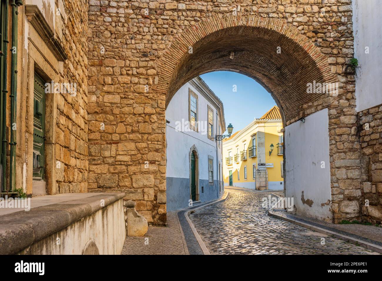 Resting Arch in medieval walls is one of 4 entrances to the old town in ...