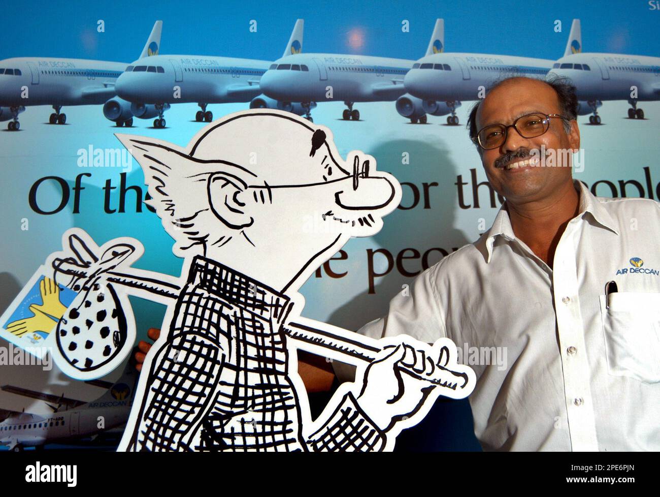 Captain G. R. Gopinath, right, Managing Director, Air Deccan, poses ...