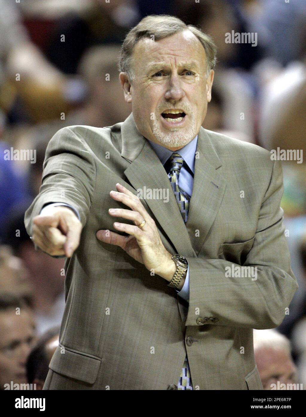 Sacramento Kings coach Rick Adelman calls to his team in the first half ...