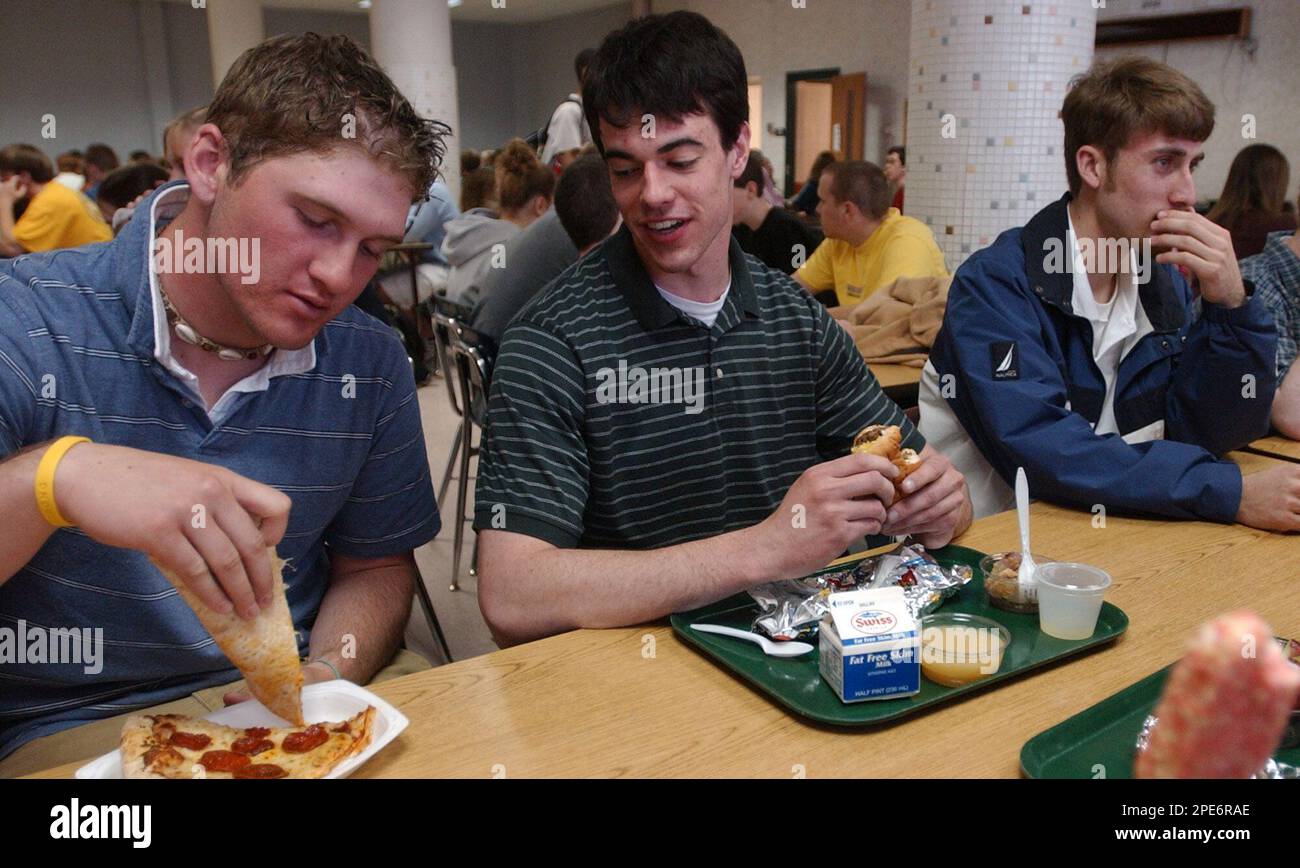 Carlisle High School senior Rick Seltzer, center, eats his lunch in the ...
