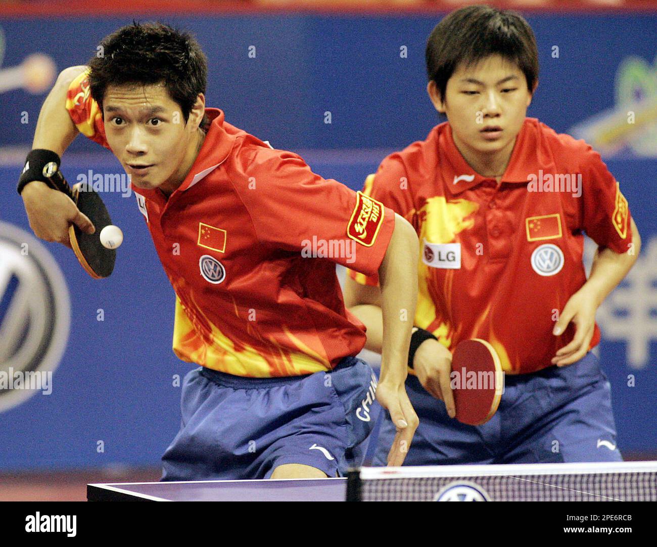 China's Qiu Yike, left, and Cao Zhen play against their compatriots Liu ...