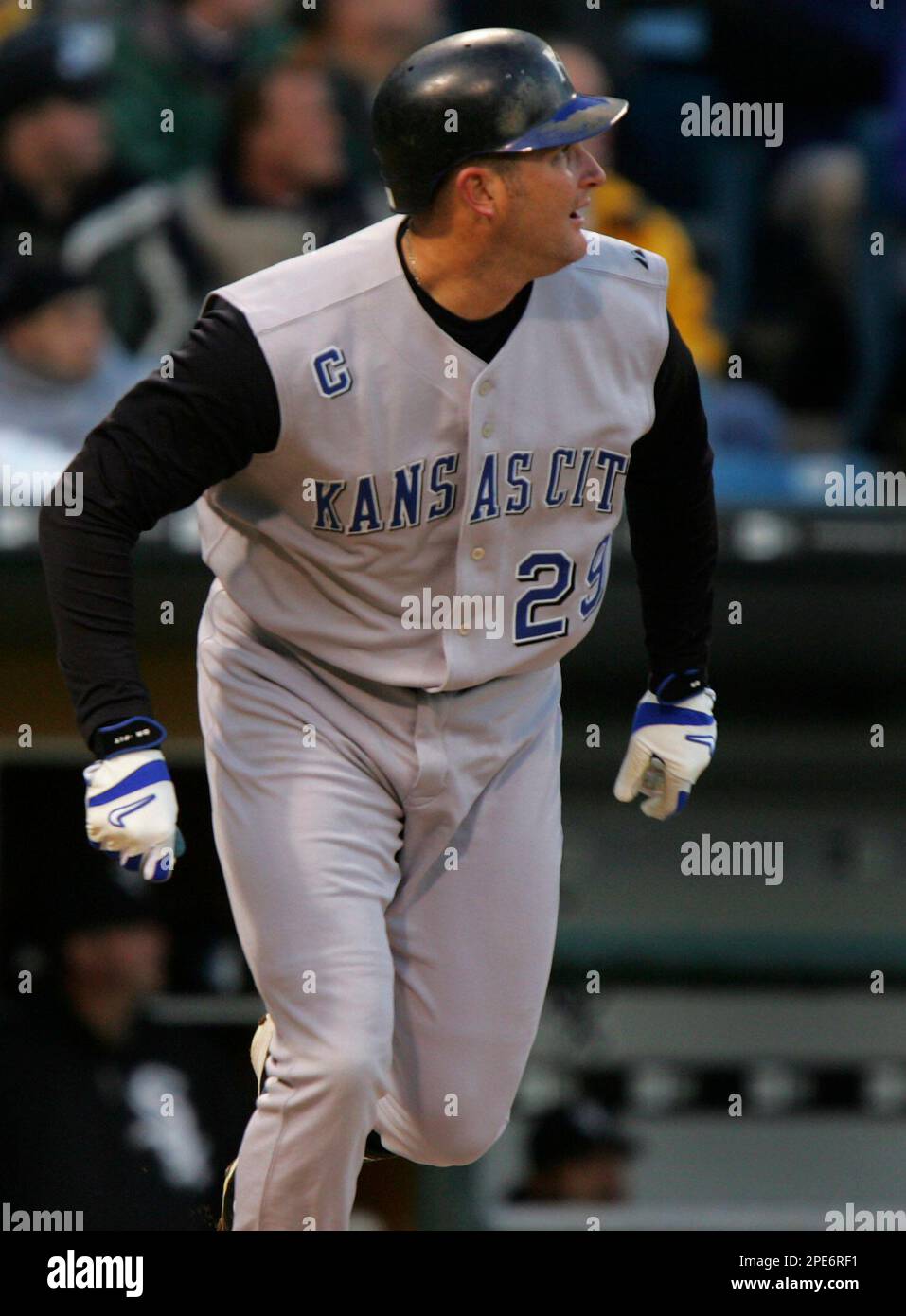 Kansas City Royals' Mike Sweeney watches the ball fly out of the park ...