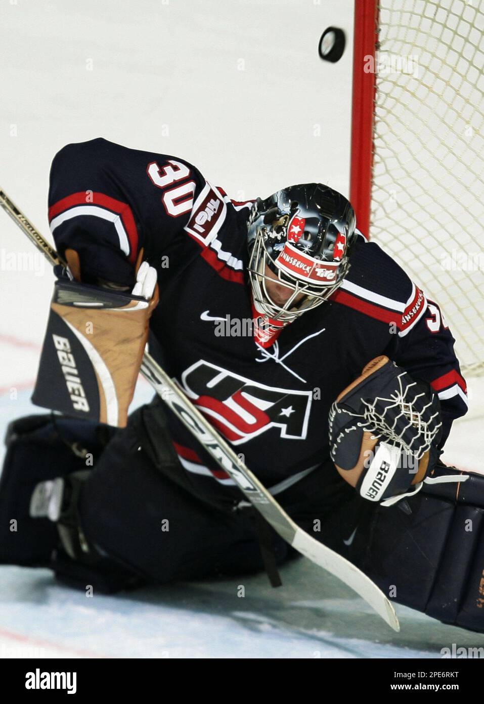 Team USA's goaltender Rick Dipietro makes the save on a Latvia shot ...