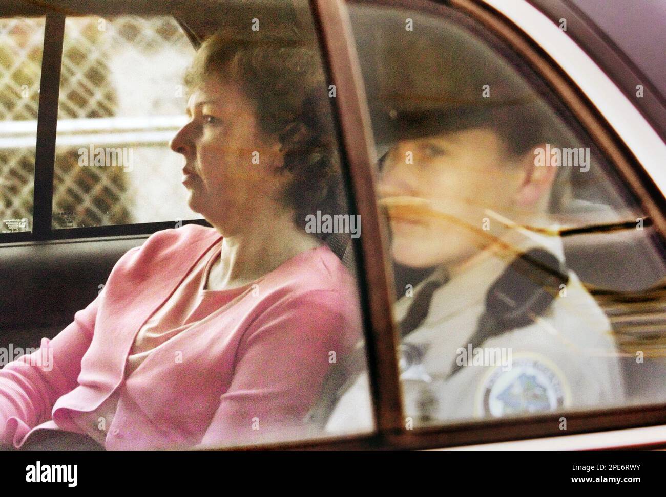Donna Blanton, left, is driven to her trial in Bowling Green, Va., Tuesday, May 3, 2005. A jury ...