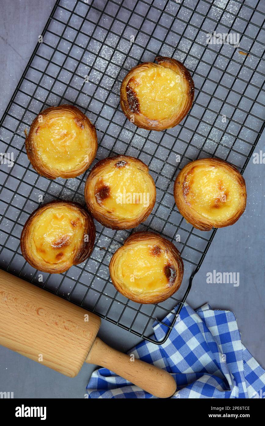 Pastel de Nata, Pasteis de Nata on a cake rack, custard tart ...
