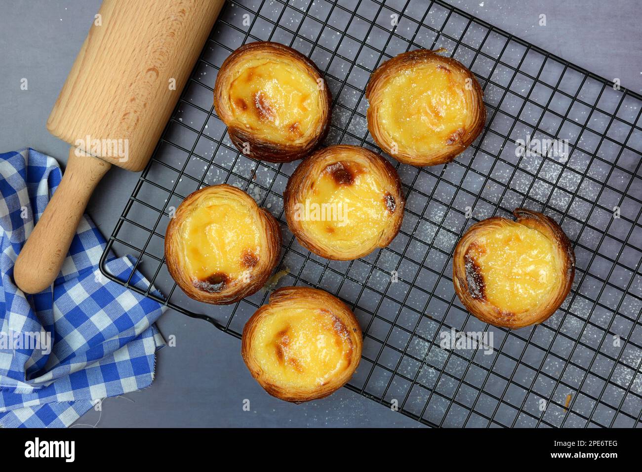 Pastel de Nata, Pasteis de Nata on a cake rack, custard tart ...